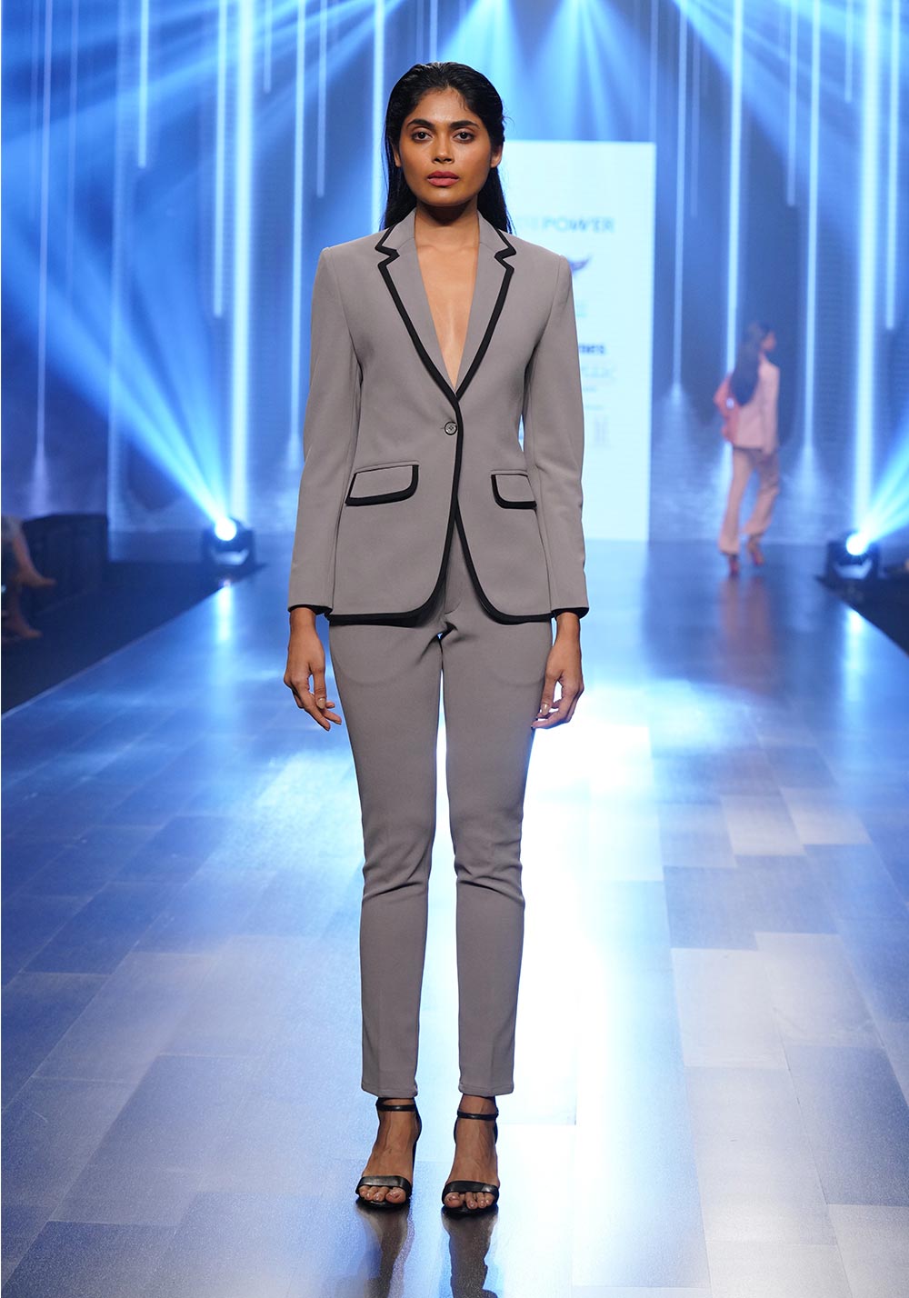 Power suit with piping details – Entrepower